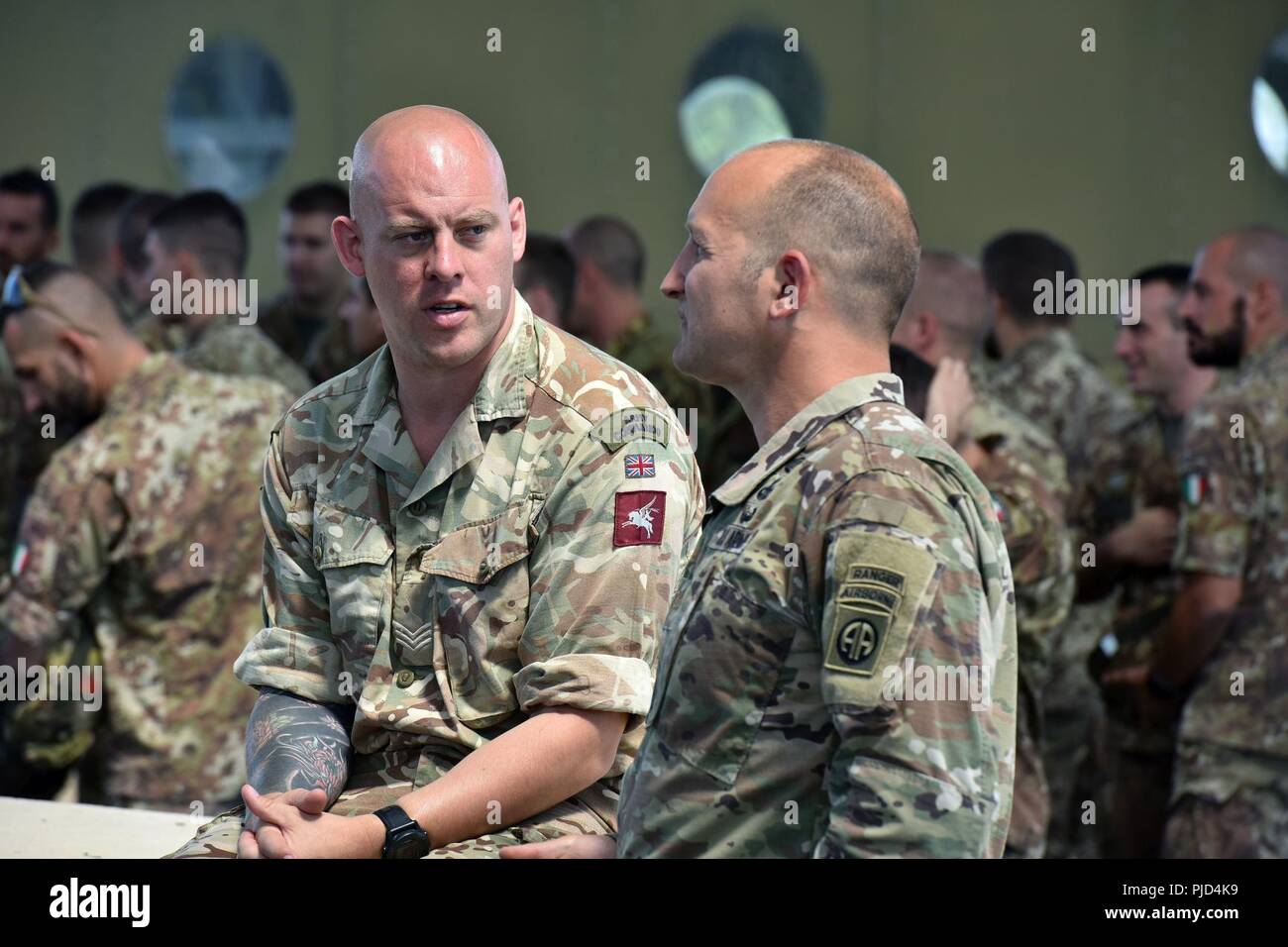 A U.S. Army Paratrooper assigned to 173rd Airborne Brigade, and a ...