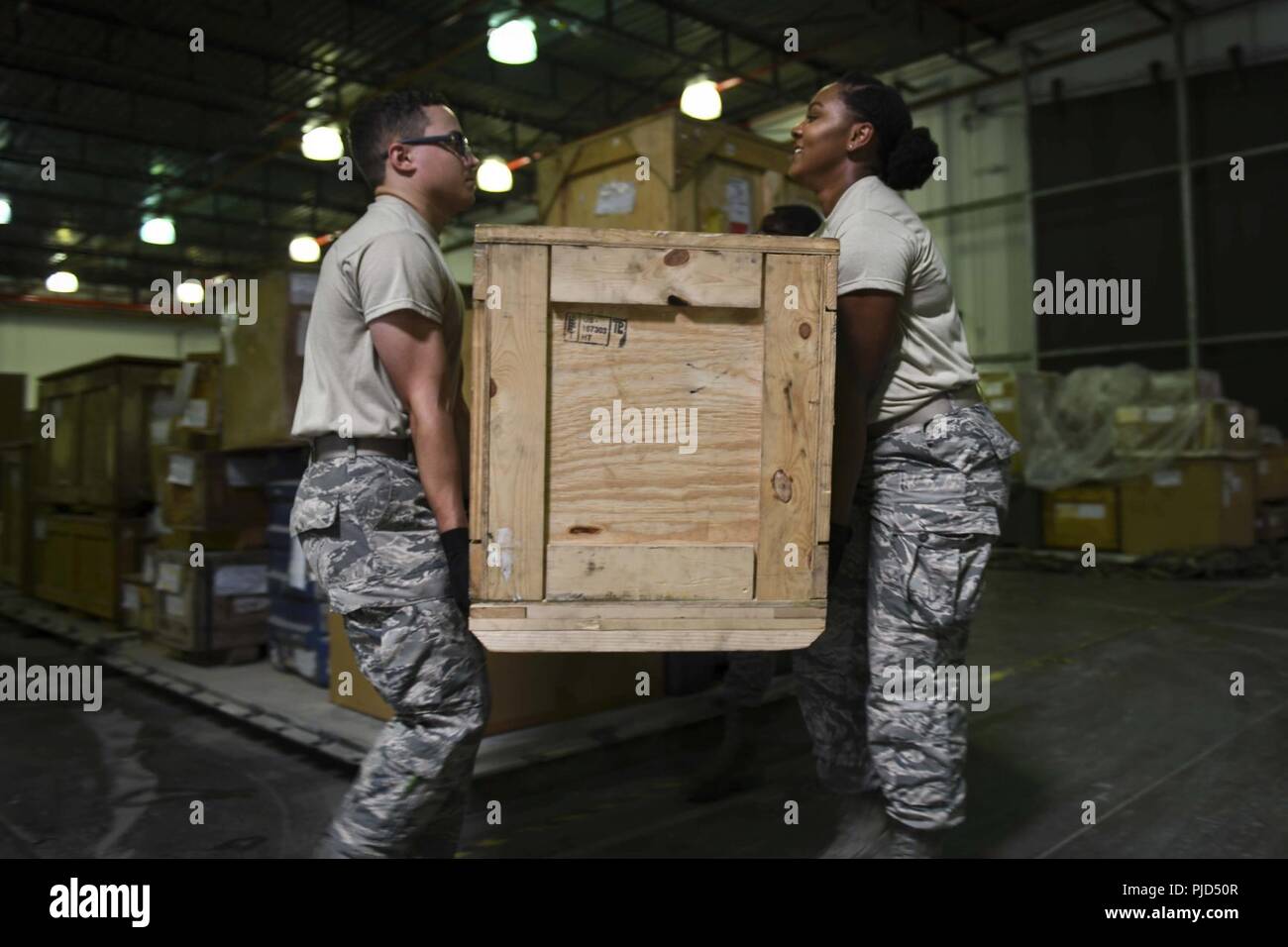 U.S. Air Force Airman Nicholas McKendall, left, a C-130 mobility ...
