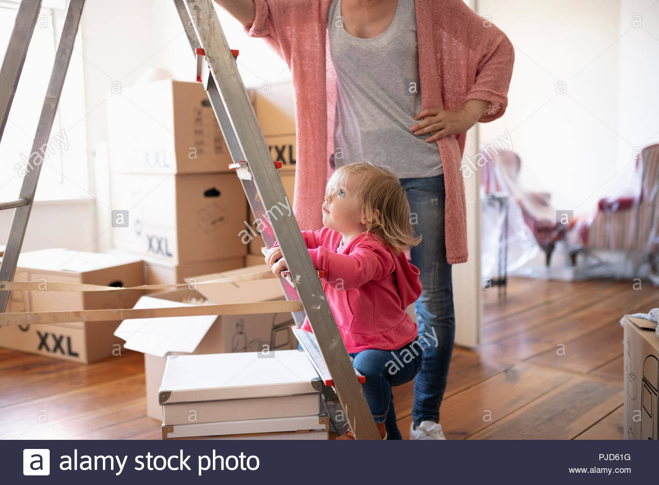 Climbing ladder woman High Resolution Stock Photography and Images - Alamy