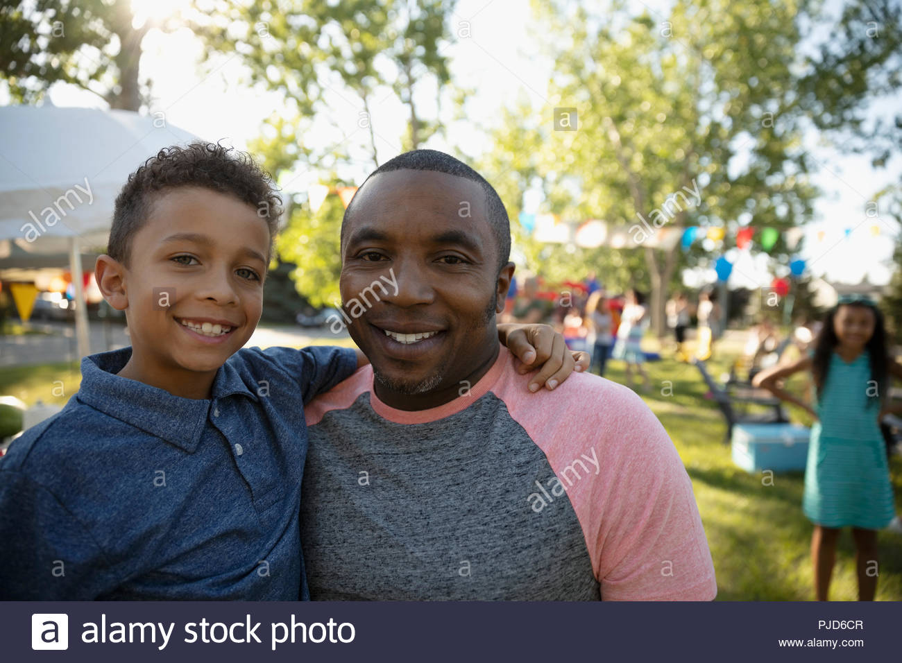 Black father son hugging on hi-res stock photography and images - Alamy