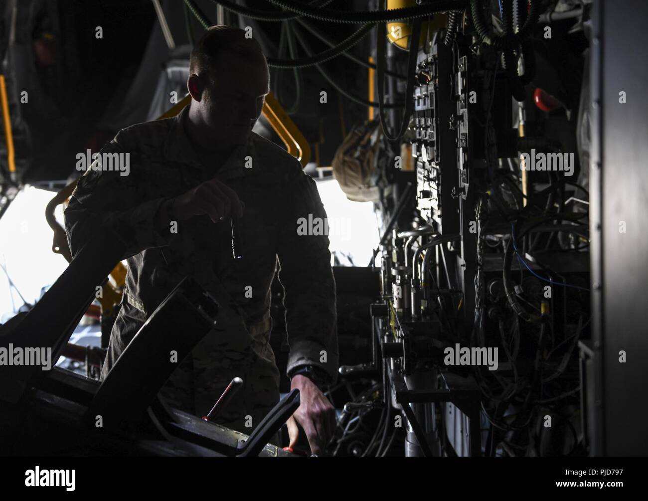 U.S. Air Force Tech. Sgt. Brett Laswell, an AC-130U Spooky gunship ...
