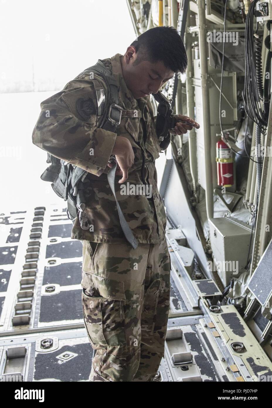 Airmen from the 17th Special Operations Squadron prepare an MC-130J ...