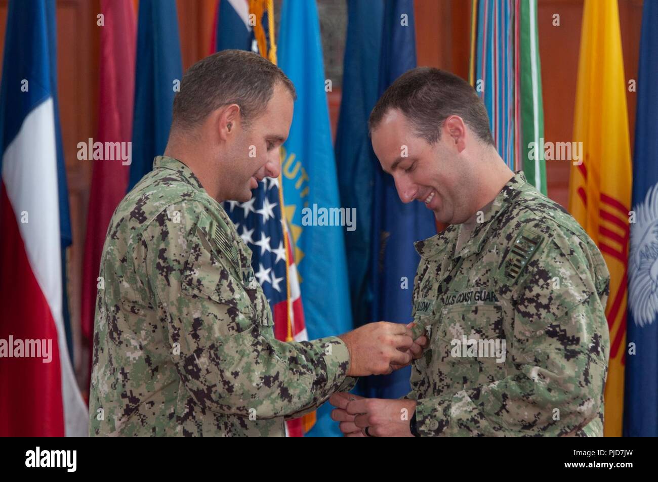 The senior ensign of Port Security Unit 309 transfers the title of Bull ...