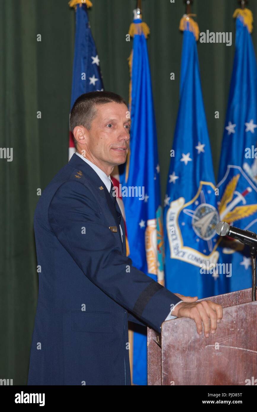 Gen. Mike Holmes, commander of Air Combat Command, officiates the ...