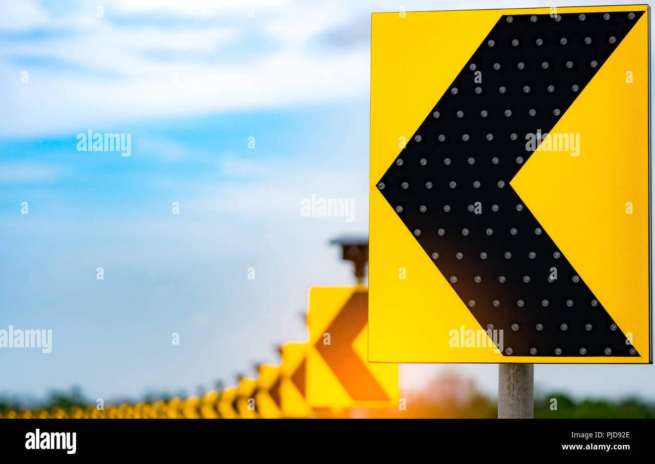 Traffic sign with solar cell panel power on blue sky and clouds ...