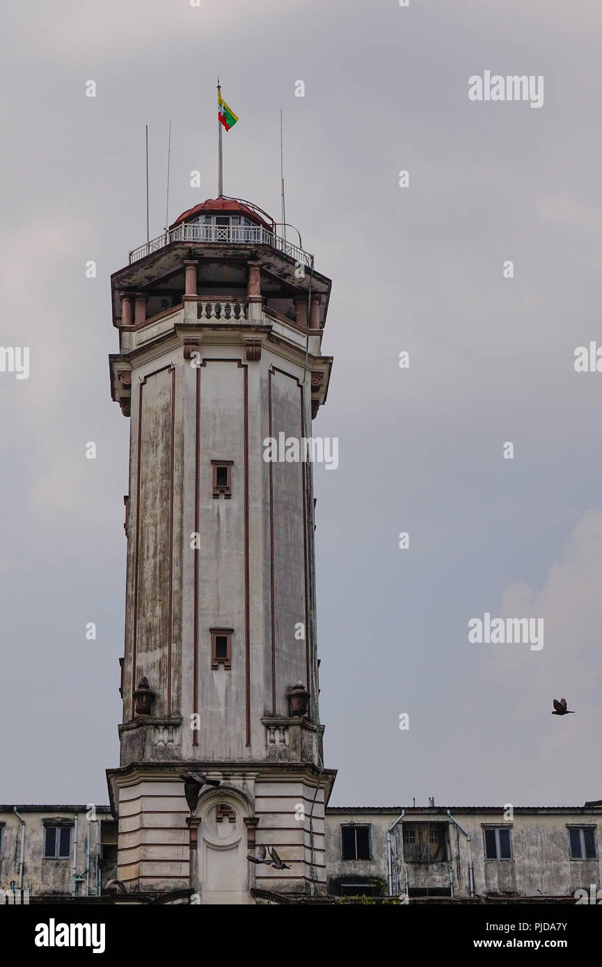Tower of ancient building in Yangon, Myanmar. Yangon has the highest ...