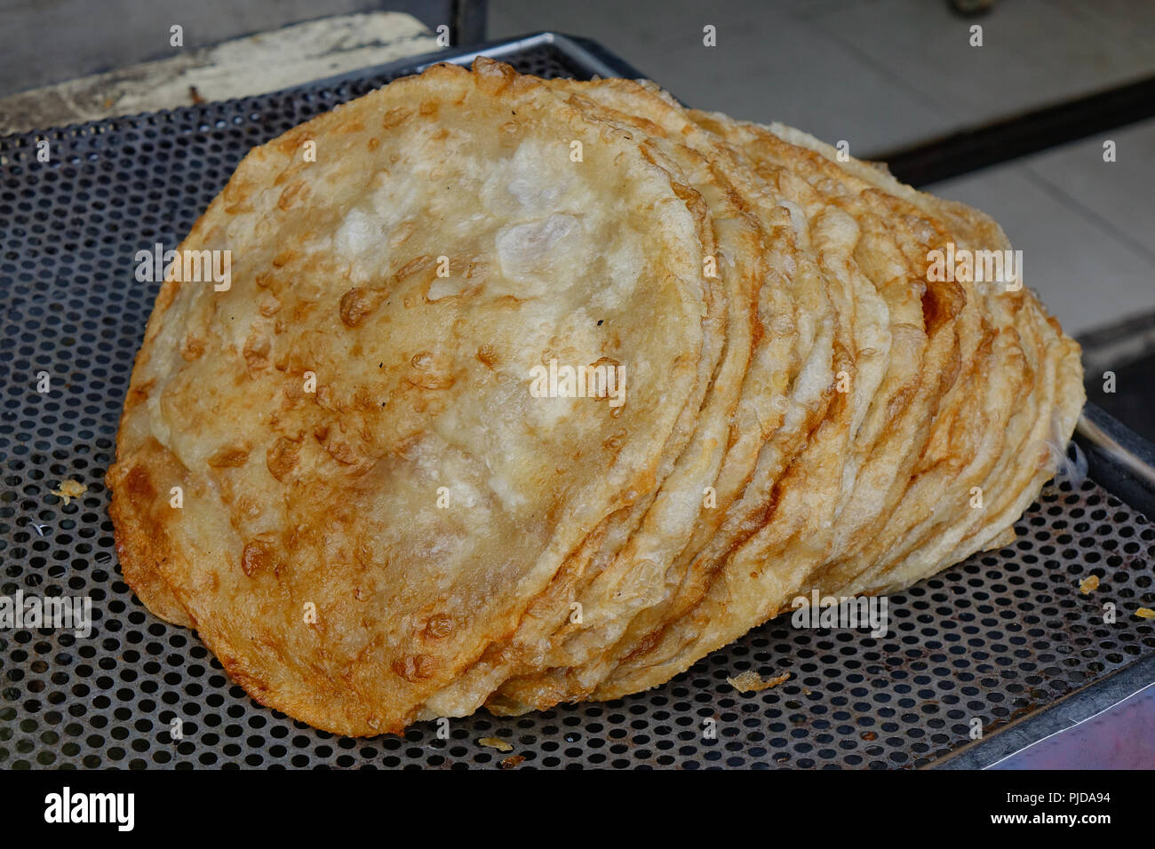Assorted Indian bread at street market in Yangon, Myanmar Stock Photo ...
