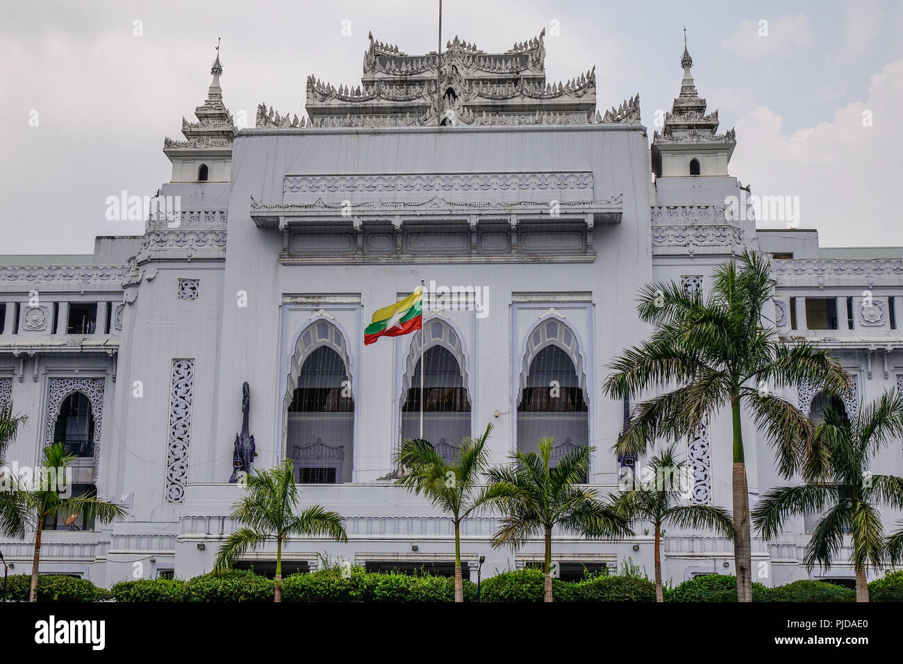 City Hall with flag in Yangon, Myanmar. Yangon served as the capital of ...