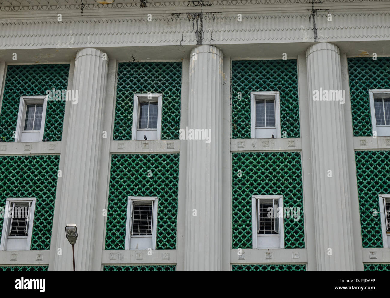 Detail of ancient building in Yangon, Myanmar. Yangon has the highest ...