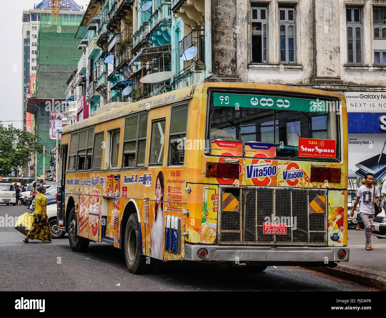 Yangon, Myanmar - Feb 26, 2016. A local bus on street in Yangon ...