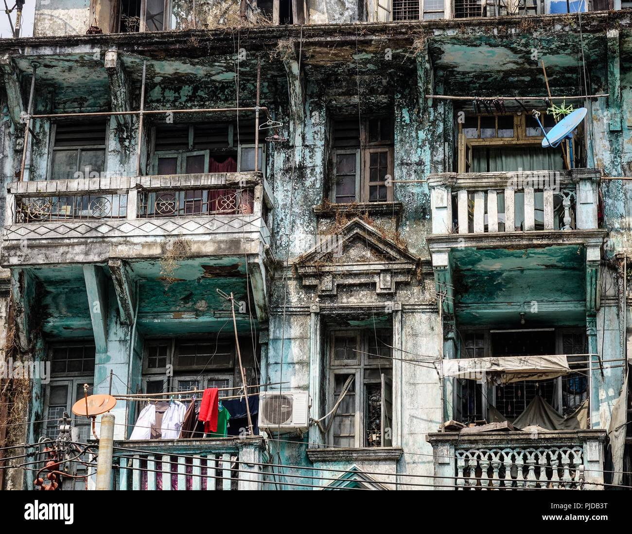 Ruined apartment in Yangon, Myanmar. Yangon has the highest number of ...