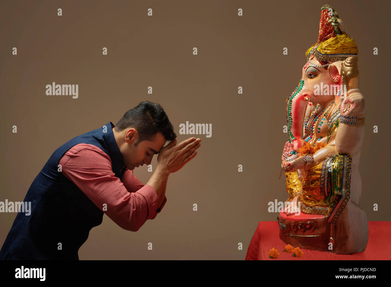 Front view man praying in hi-res stock photography and images - Alamy