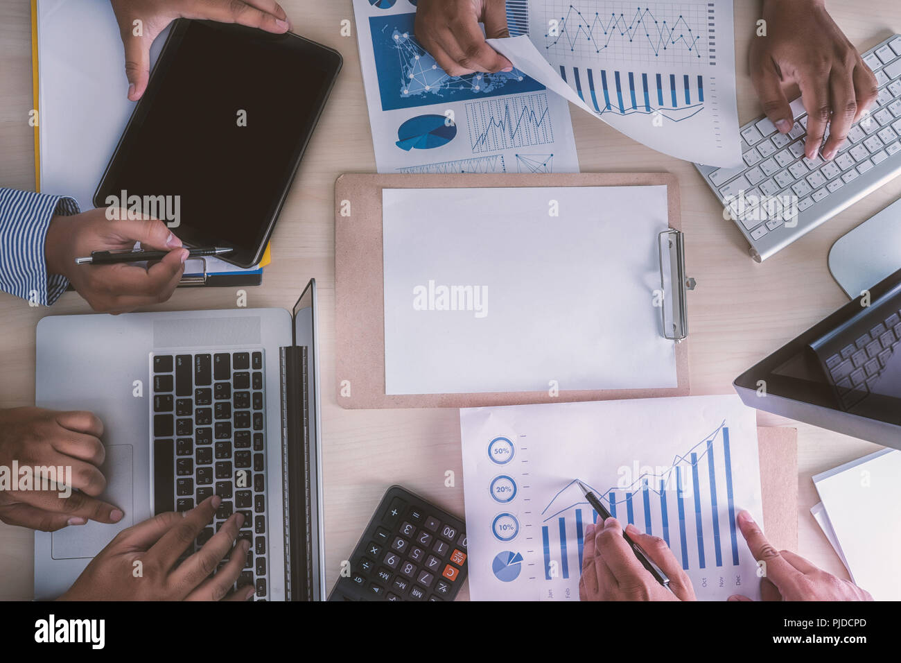 teamwork reports accounting concept analyzing financial Stock Photo - Alamy