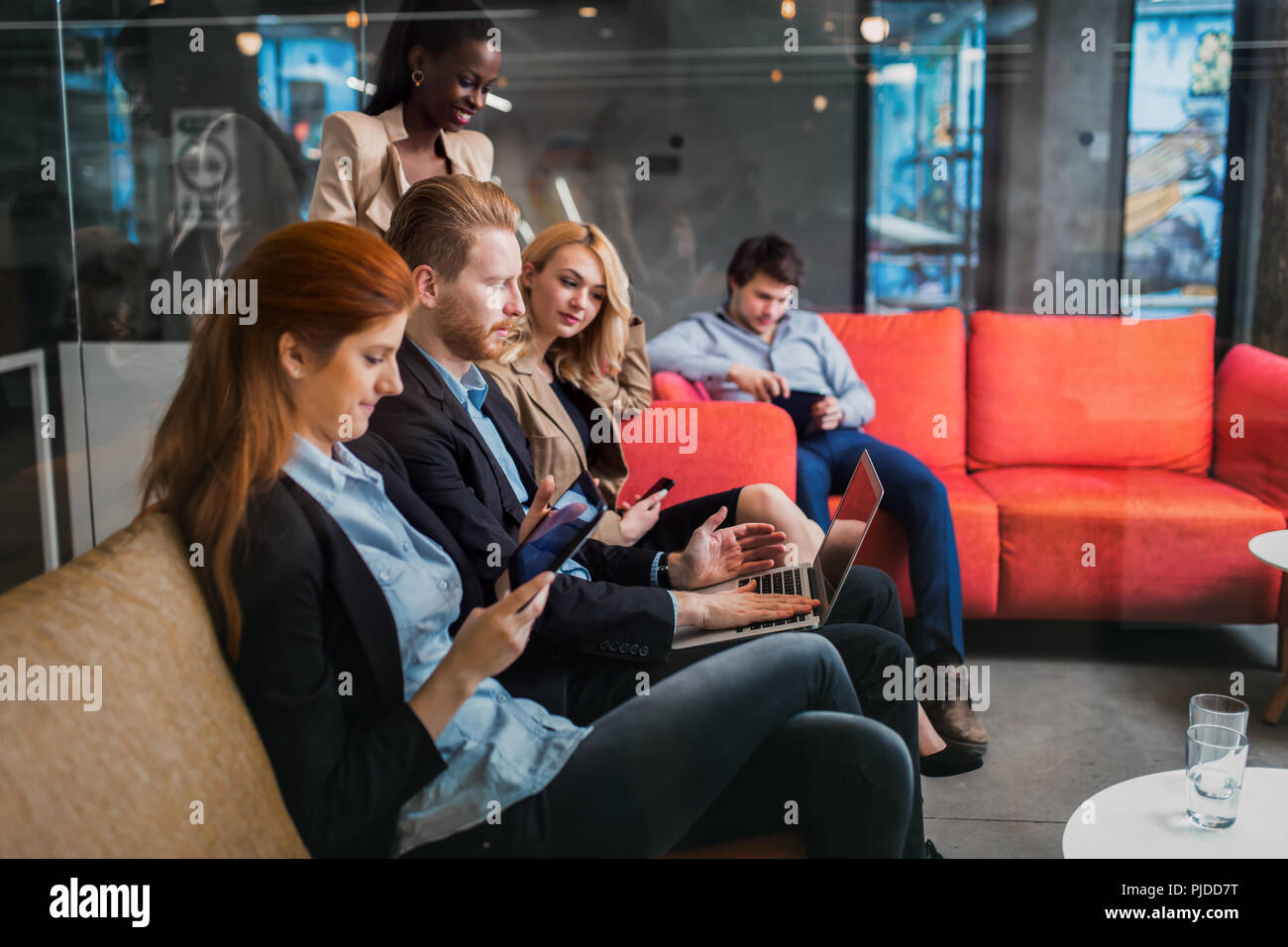 Business people conversation. Technology at hand Stock Photo - Alamy