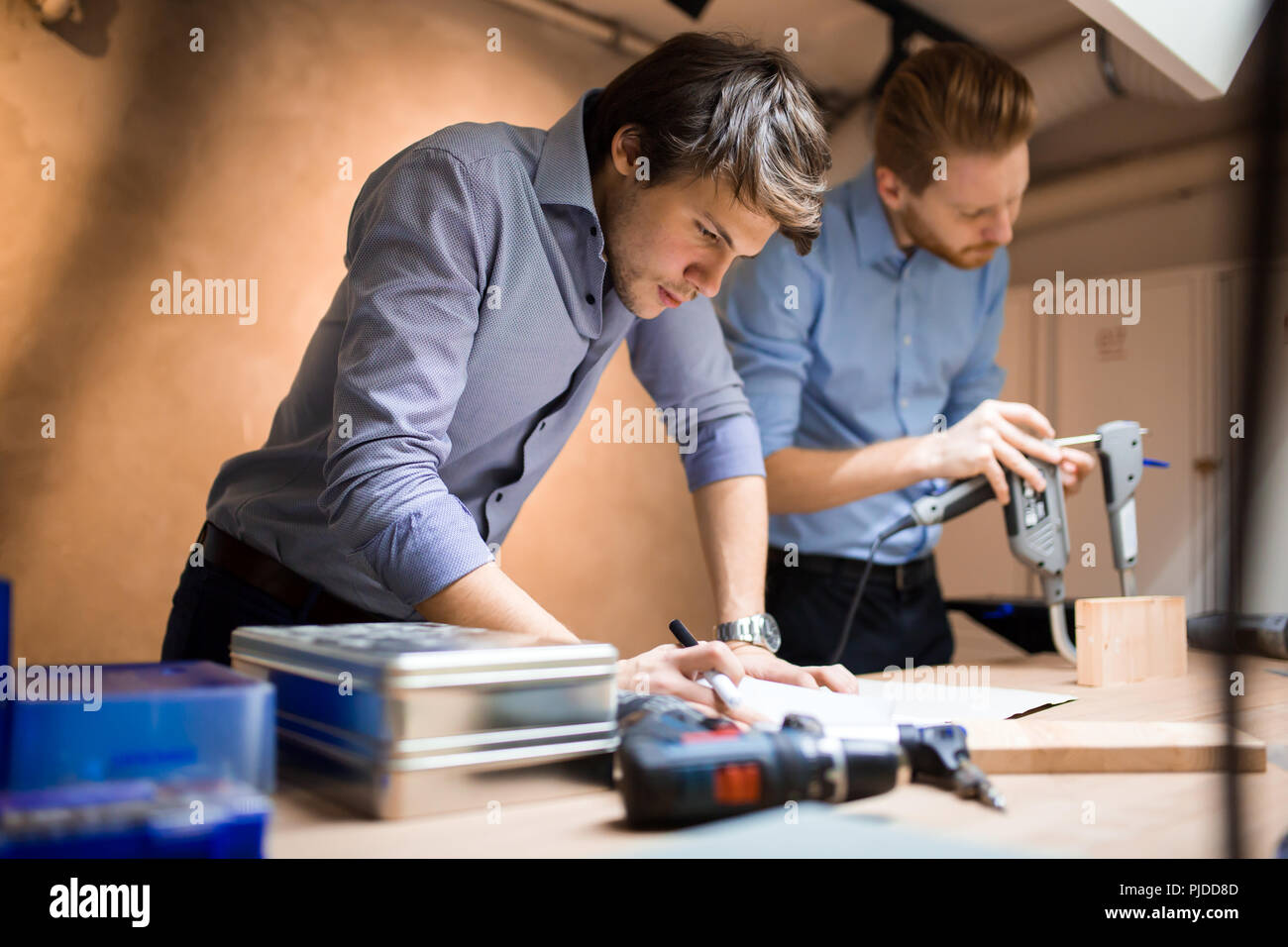 Two designers working together Stock Photo - Alamy