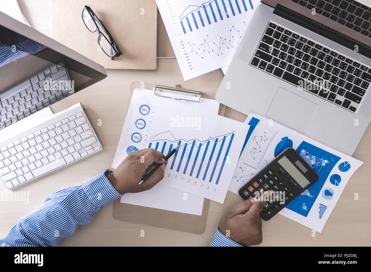 teamwork reports accounting concept analyzing financial Stock Photo - Alamy