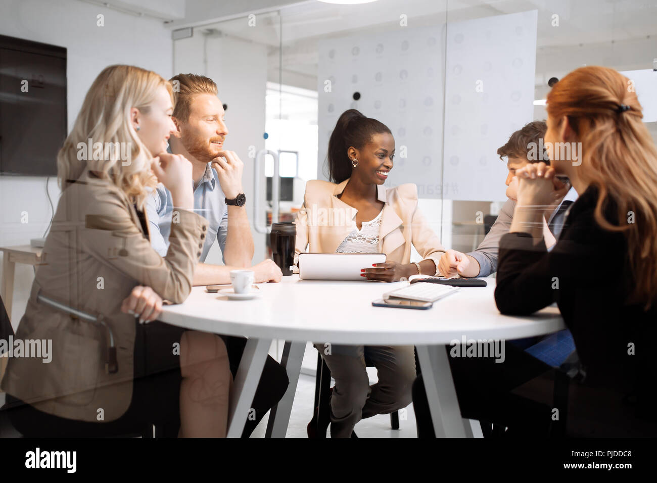 Business people meeting at round table Stock Photo - Alamy