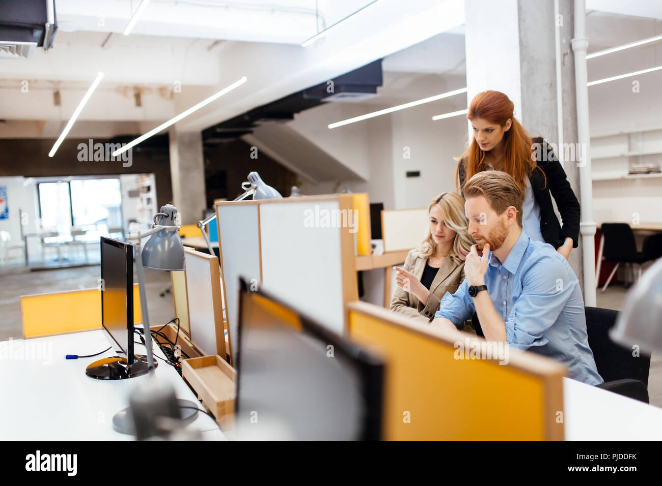 Team designers work sitting table hi-res stock photography and images ...