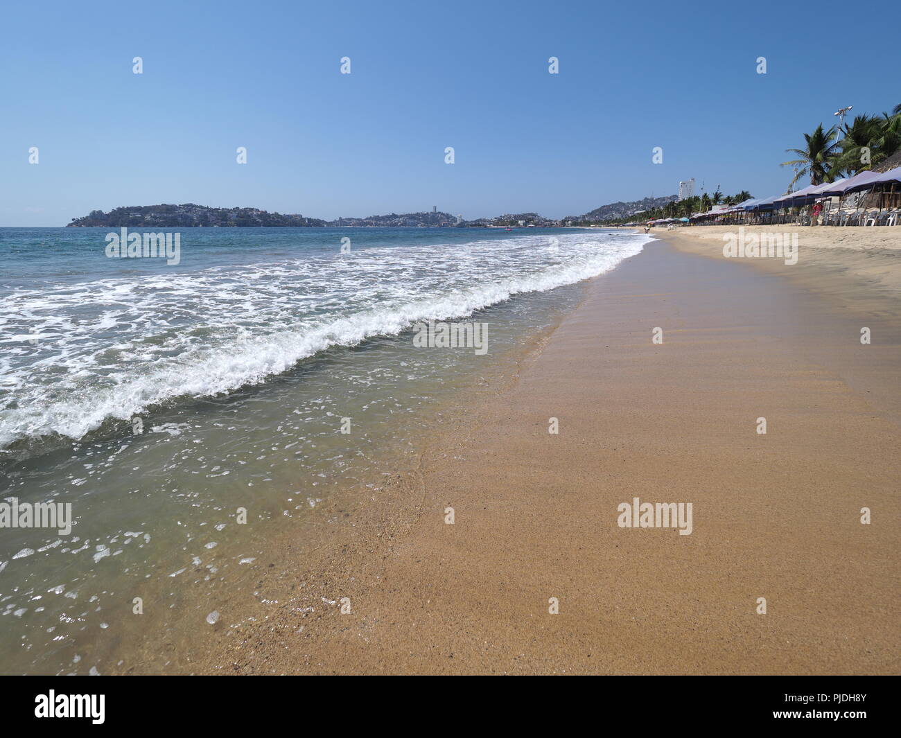 Nice panorama of sandy beach at bay of ACAPULCO city in Mexico with ...