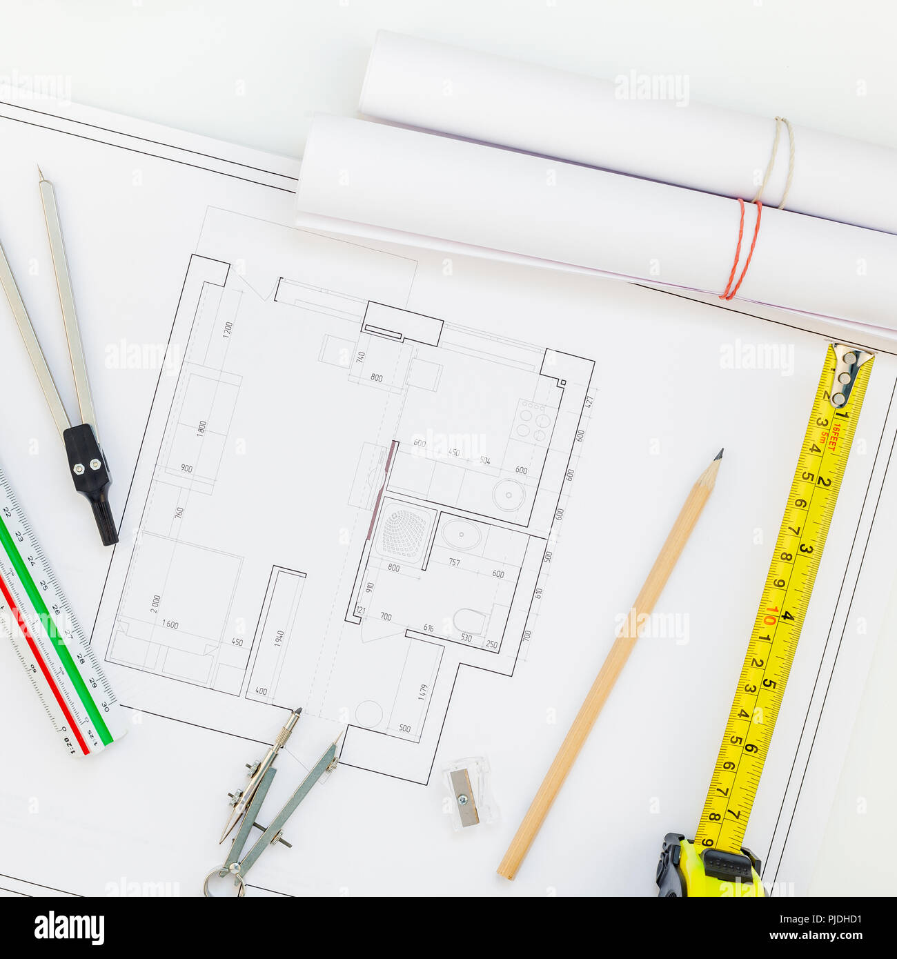 Creative flat lay overhead top view blueprints architectural flat ...