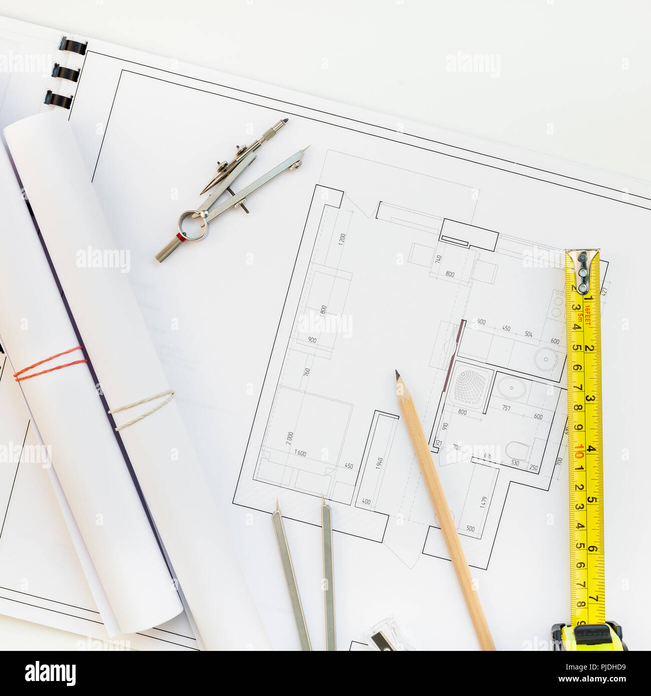 Creative flat lay overhead top view blueprints architectural flat ...