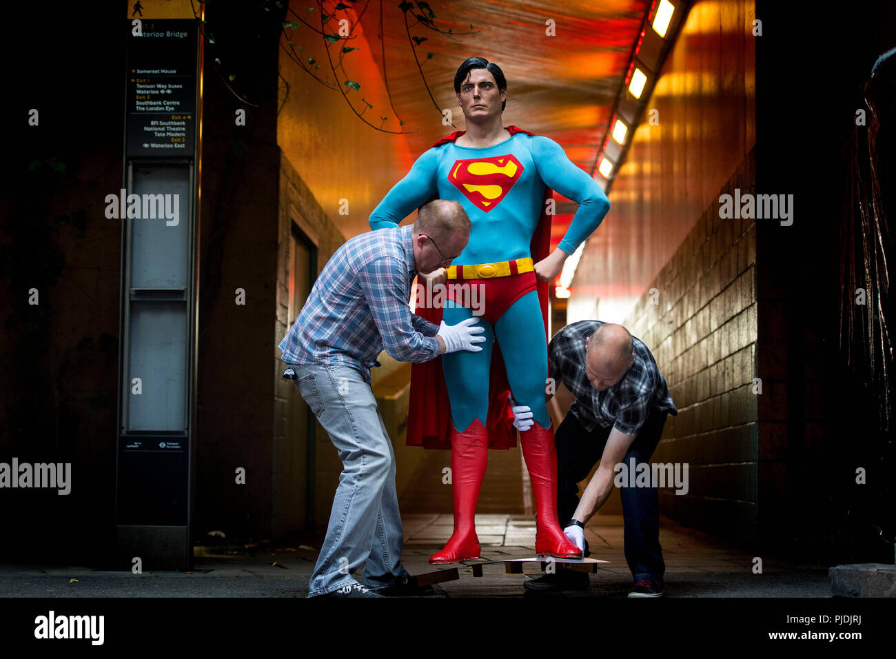 Staff prepare a Superman costume used by Christopher Reeve in Superman ...