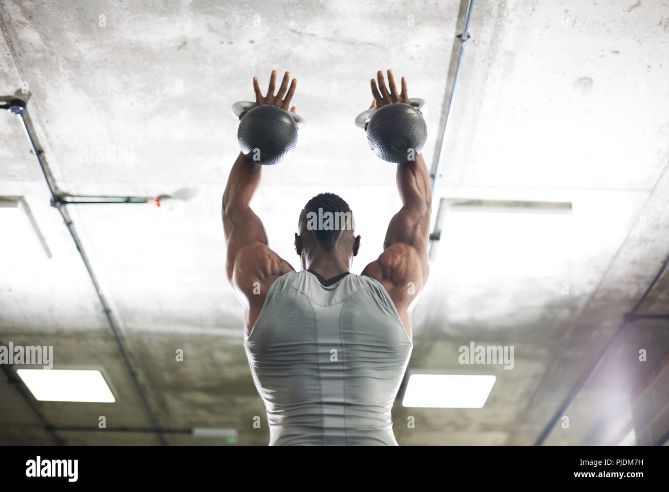 Man lifting arms hi-res stock photography and images - Alamy
