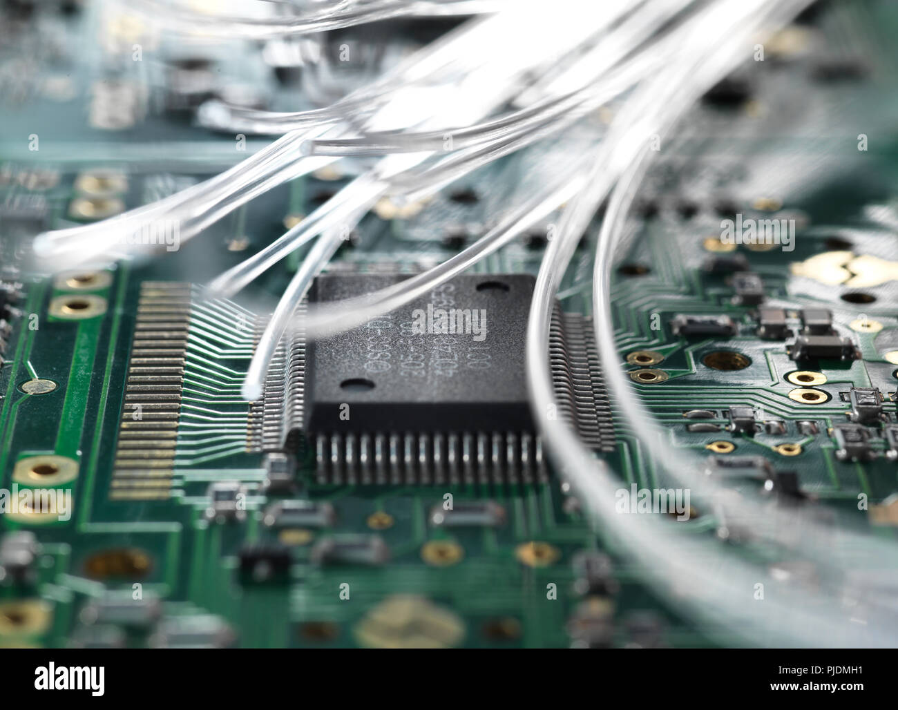 Fibre optics carrying data passing through a circuit board to ...