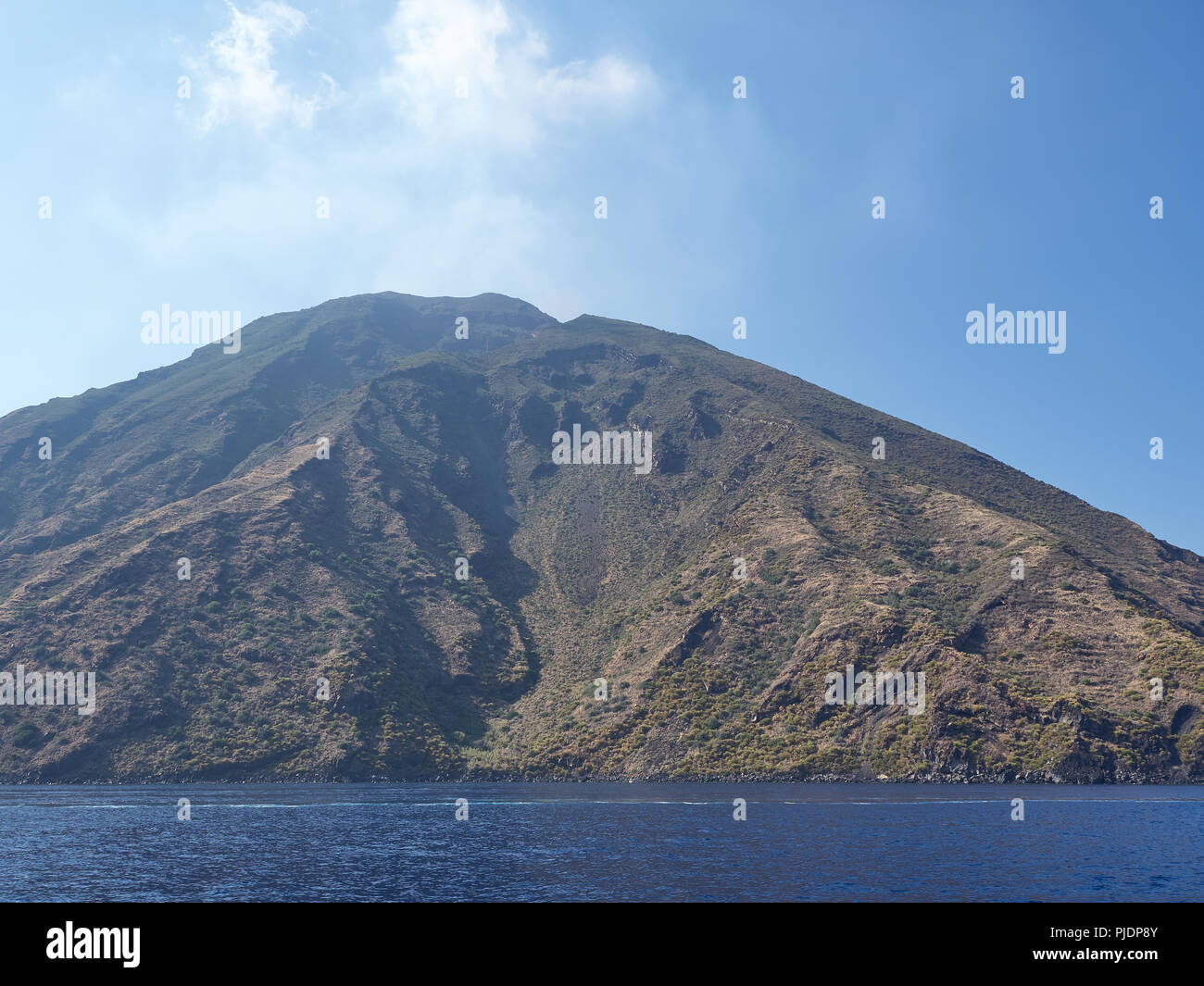 View of Stromboli island and volcano from the boat in a summer ...