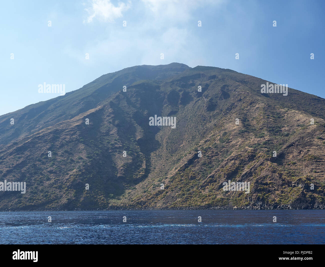 View of Stromboli island and volcano from the boat in a summer ...
