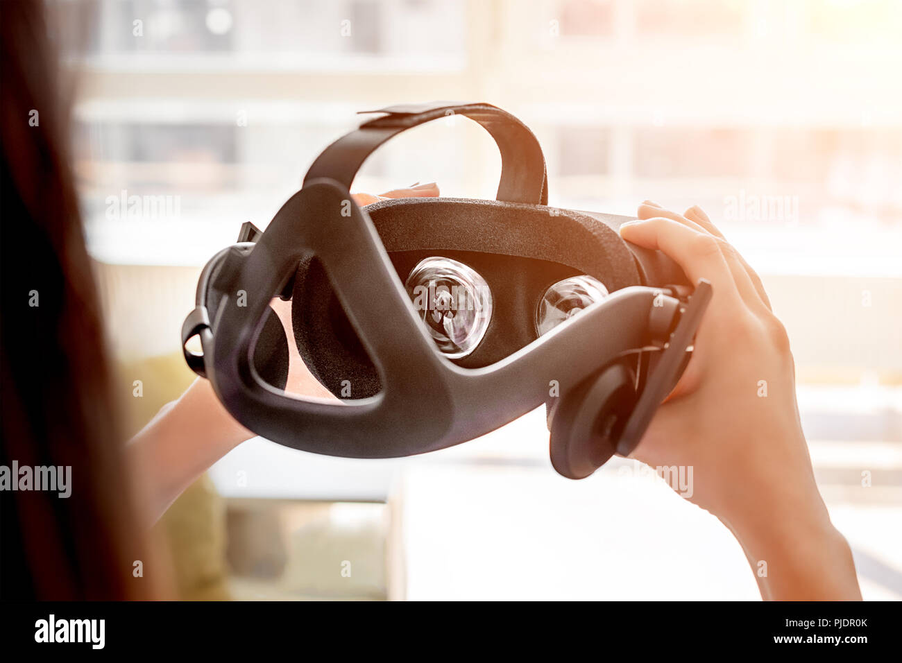 Hands holding virtual reality helmet. Concept for virtual visual in ...
