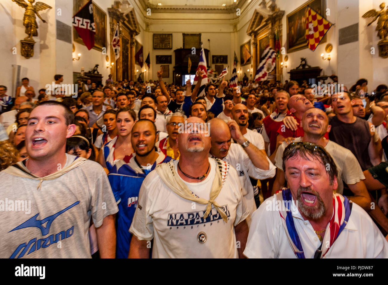 Members Of The Victorious Istrice Contrada Inside The Church of Santa ...