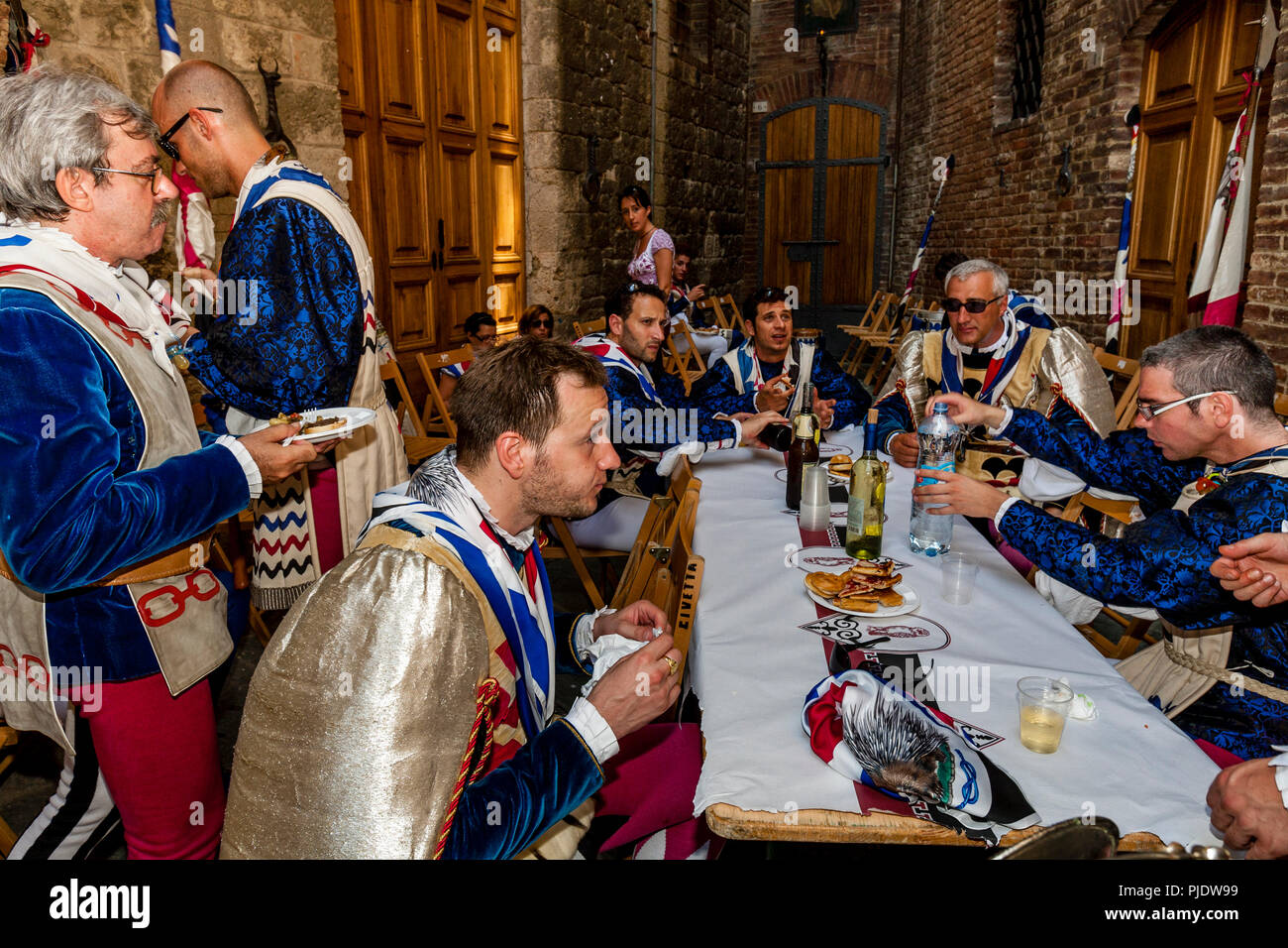 Members Of The Winning Istrice Contrada Stop For Refreshments As They ...