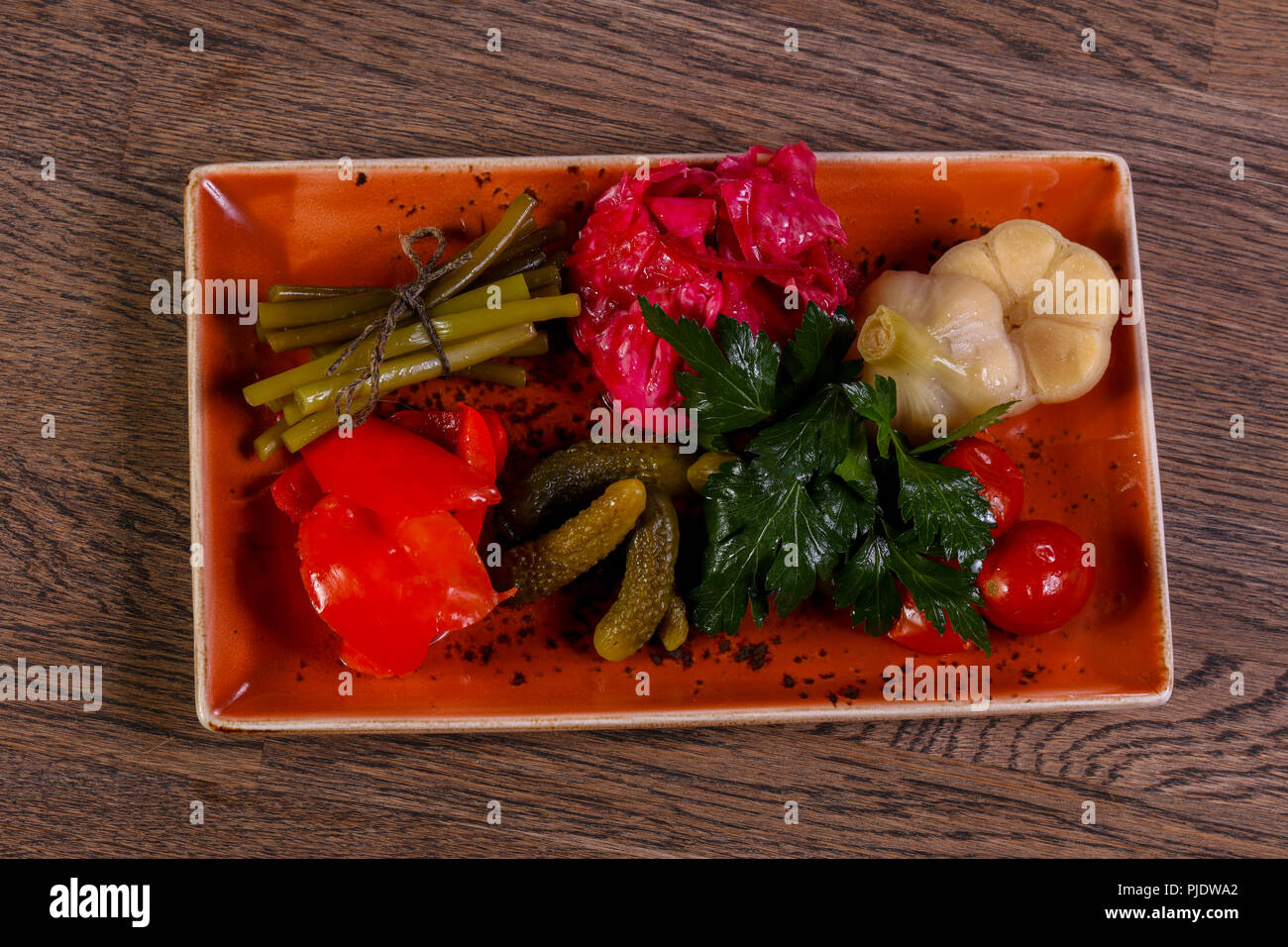 Pickled vegetables plate mix with parsley Stock Photo - Alamy