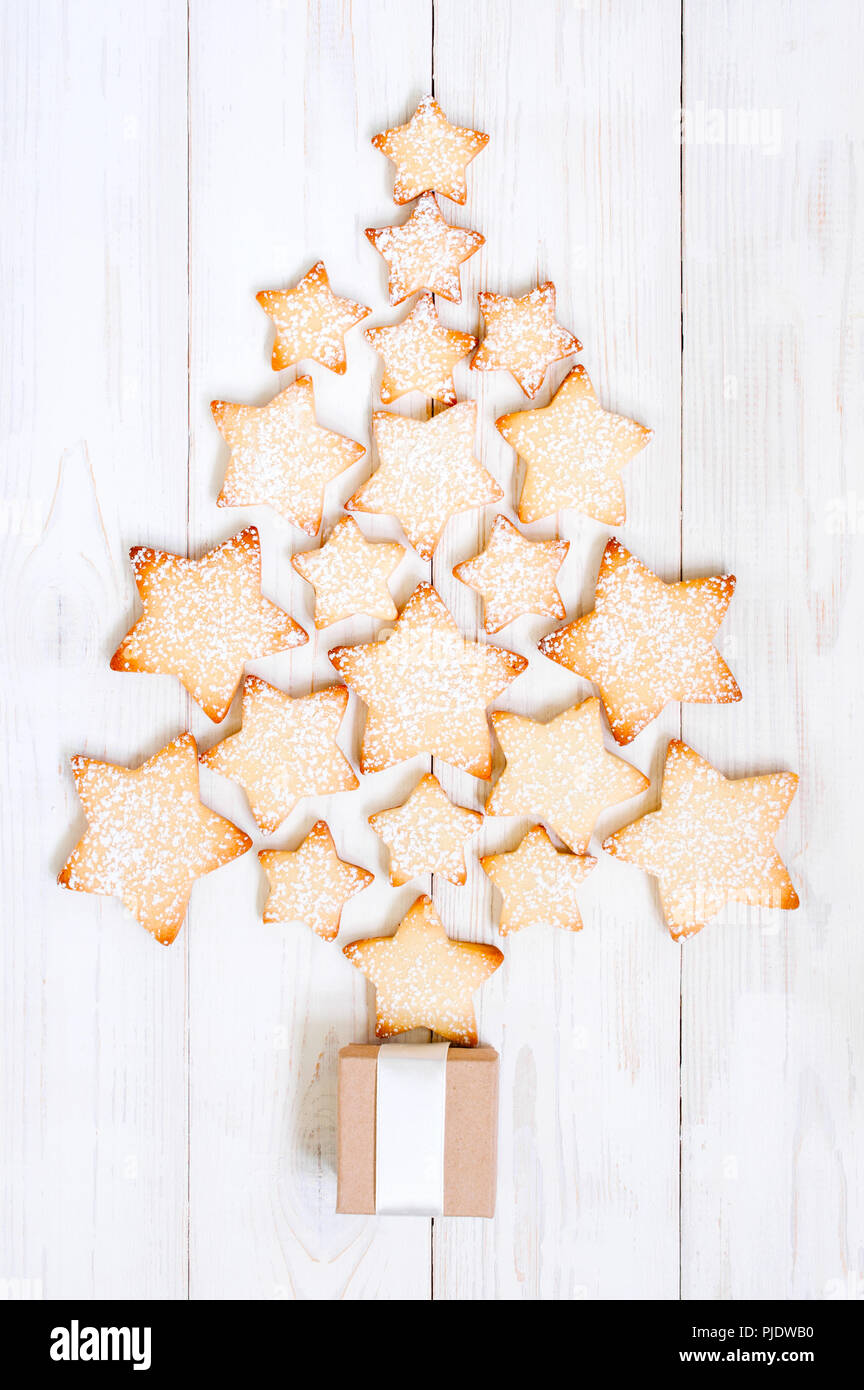 Christmas tree of shortbread on the white wooden table, top view Stock ...