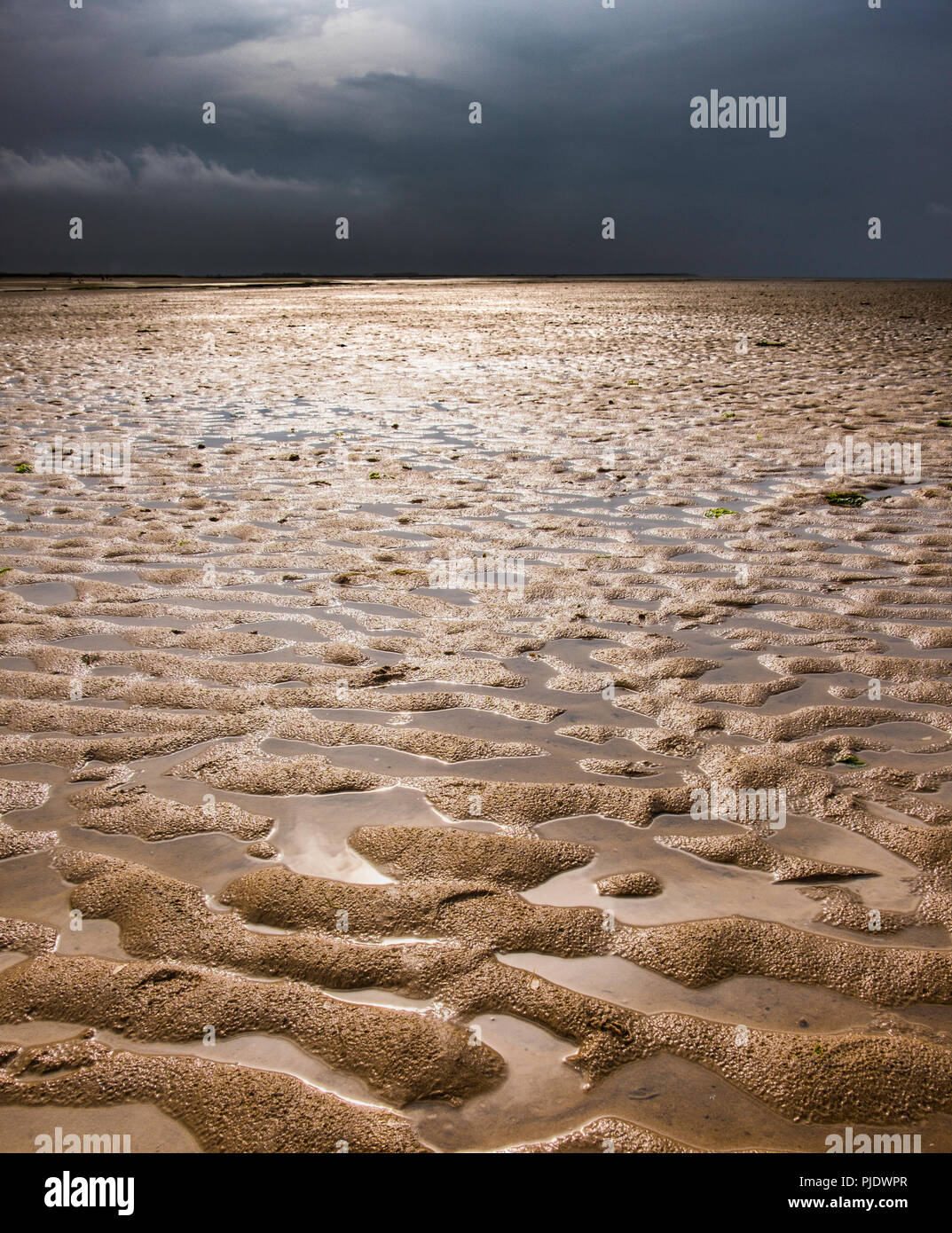 Patterns in the sand at low tide Stock Photo - Alamy
