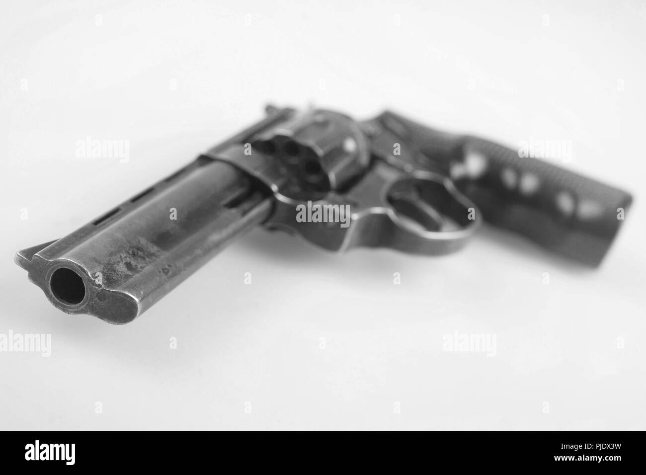 Revolver on white background Stock Photo - Alamy