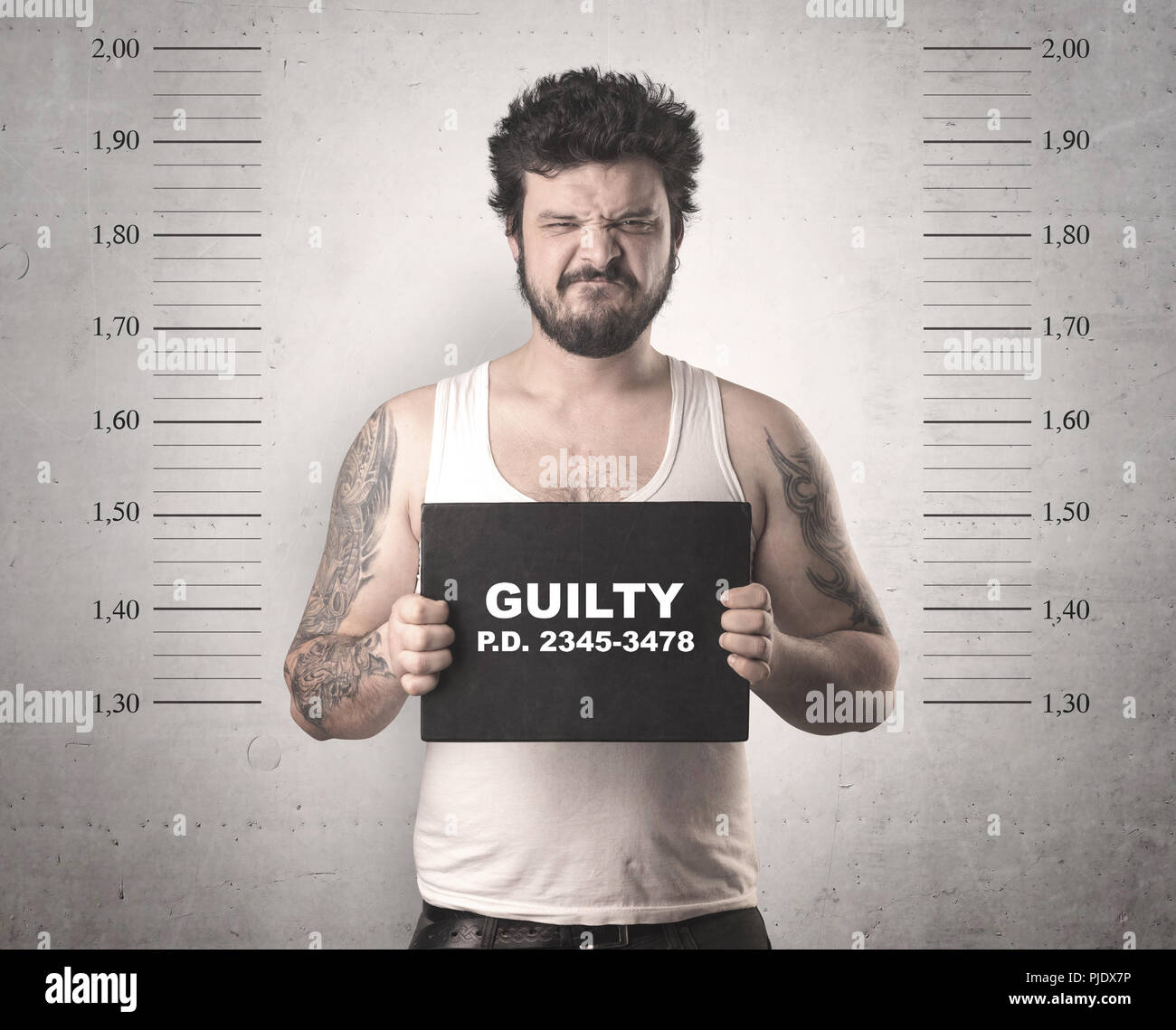 Caught guilty man with ID signs on his hand Stock Photo - Alamy