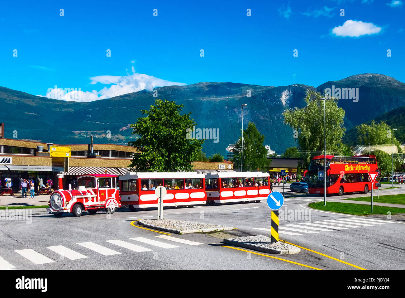 Norway, Olden - August 1, 2018: Tourist train and bus, mountain ...