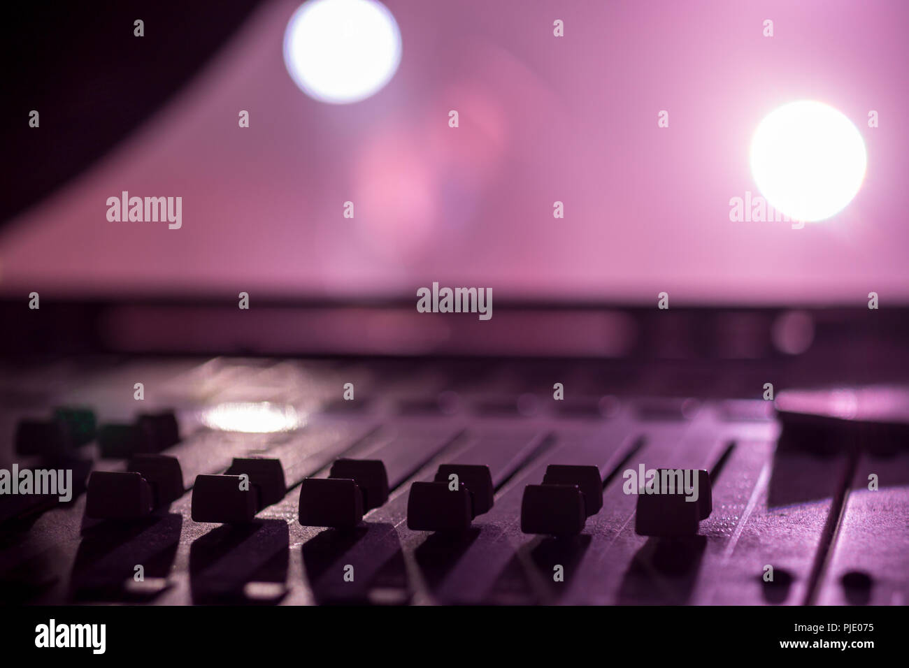 Stage side Low level view of Faders on a Professional Audio Sound ...