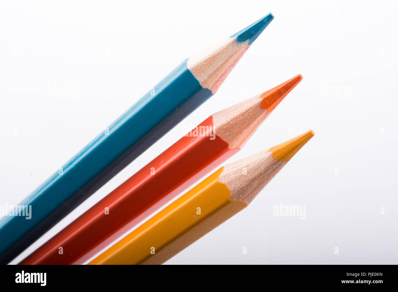 Three Color Pencils on a white background Stock Photo - Alamy