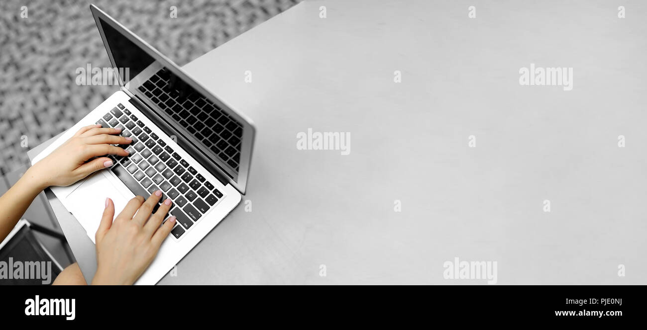 Website header and banner of laptop with typing female hands, copy ...