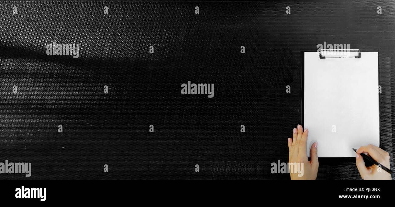 Banner and blog header with copy space notebook and female hands with ...