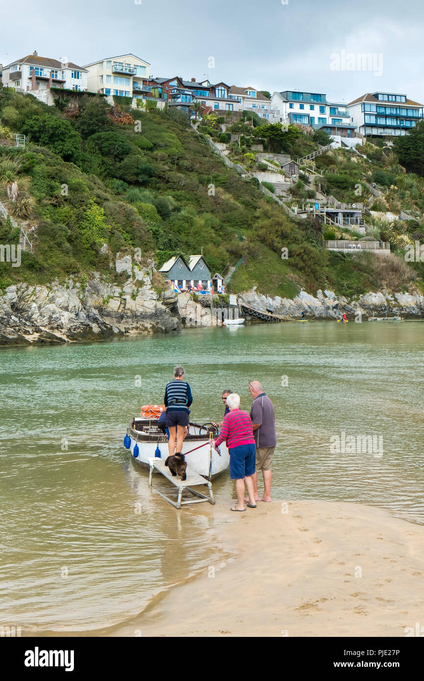 Passengers boarding the River Gannel ferry at Crantock Beach in Newquay ...