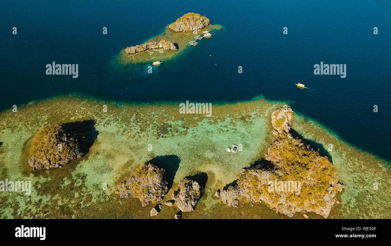Aerial view: beach, tropical island, sea bay and lagoon, Palawan ...