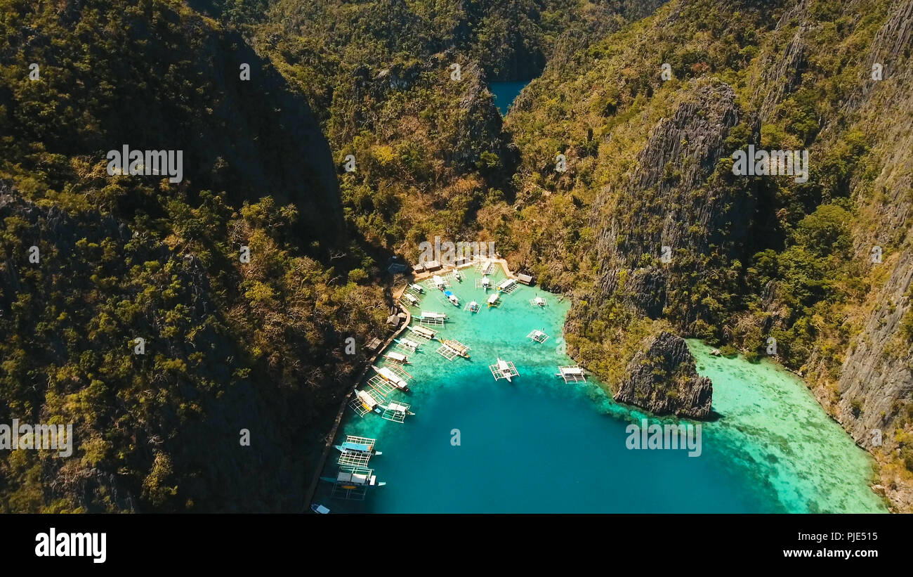 Tropical lagoon with azure water, beach by the Kayangan Lake ...