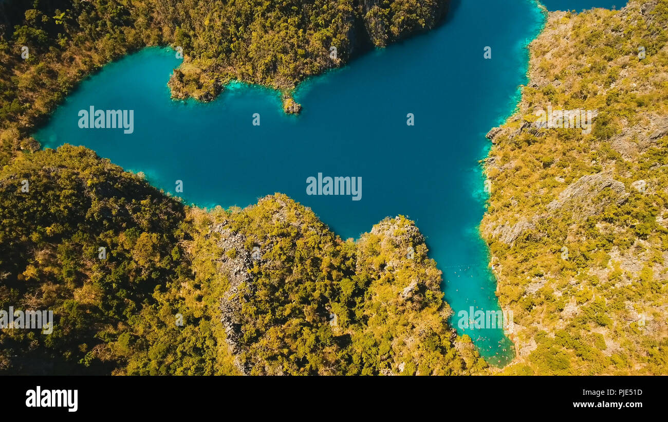 Aerial view:Mountain Kayangan lake,on a tropical island with blue water ...