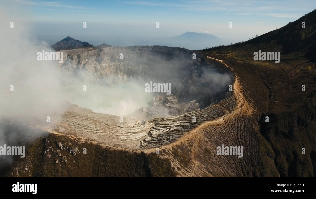 Crater with acidic crater lake, Kawah Ijen the famous tourist ...