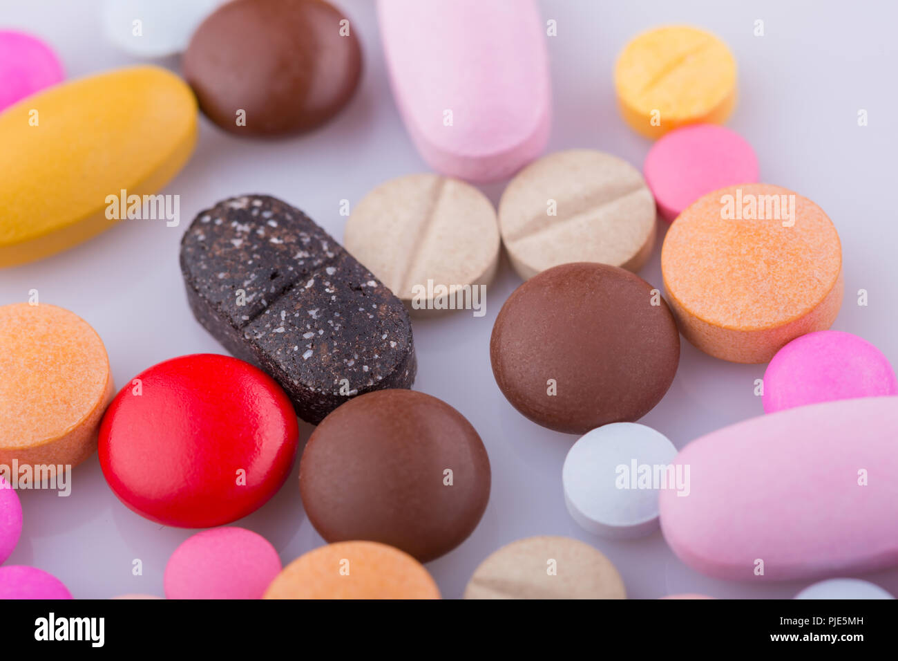 different Tablets pills capsule heap mix therapy drugs Stock Photo - Alamy