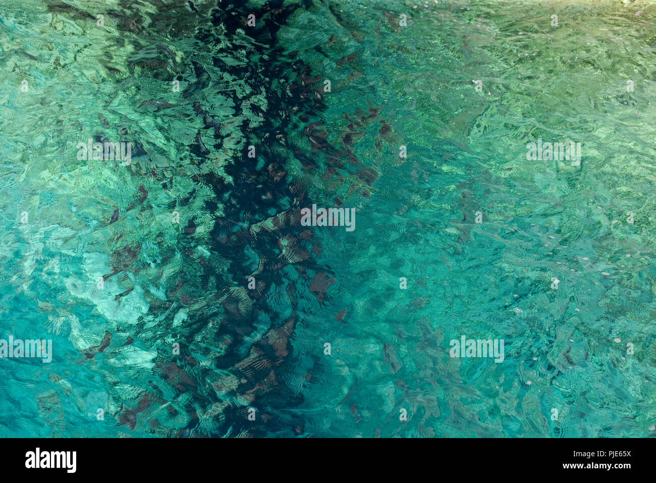 Ripples in the waves sea colours Stock Photo - Alamy